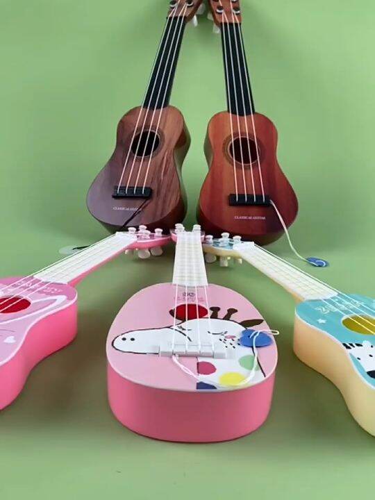 Mainan Anak Ukulele Gitar - Guitar Anak Musical Kado Ulang Tahun Anak ...