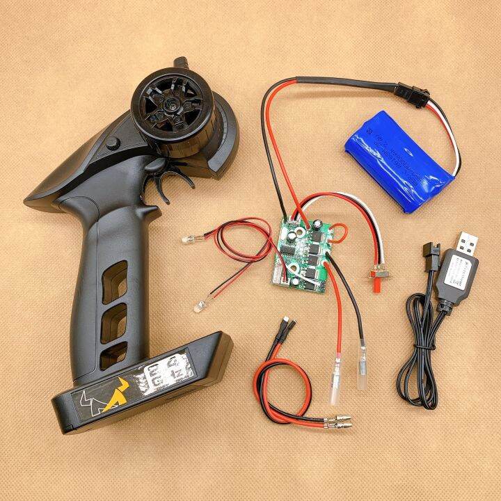 Tay điều khiển 2 kênh 2.4GHz có điều tốc 20A, điều hướng = servo chế xe ...