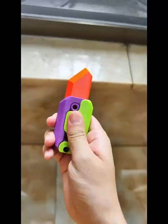 New 3D Gravity Gyro Rotary Telescopic Radish Knife Toy Novel ...