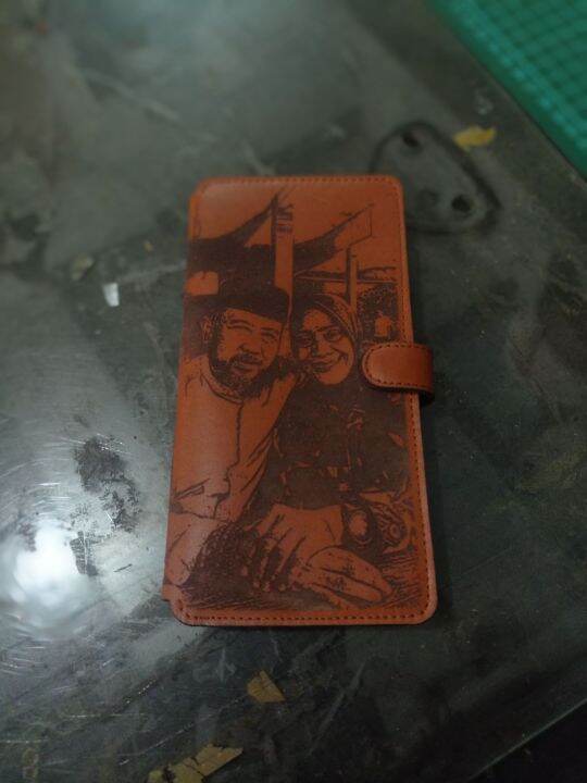 Dompet Handphone kulit asli Sukaregang Garut bisa order gambar Sesuai ...
