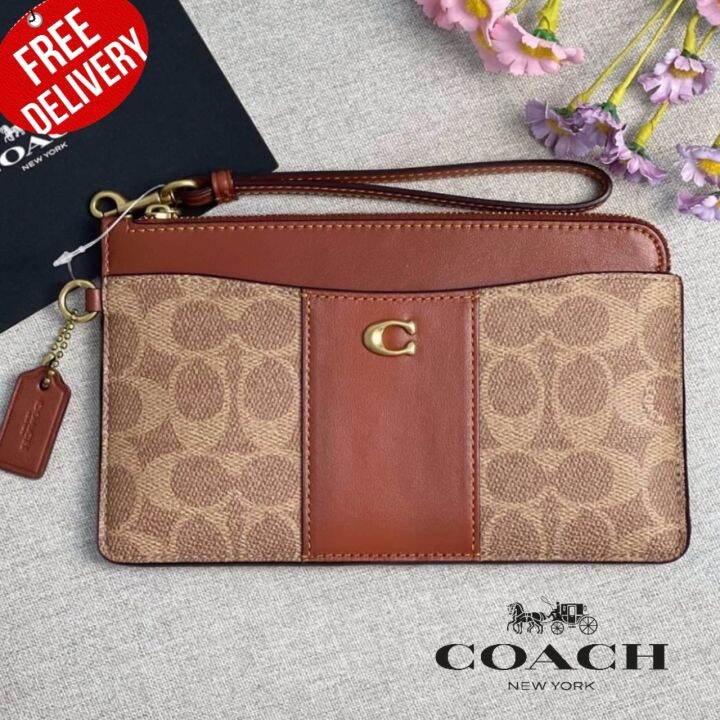 กระเป๋าสตางค์ คล้องมือ COACH L - ZIP WRISTLET IN SIGNATURE CANVAS ...