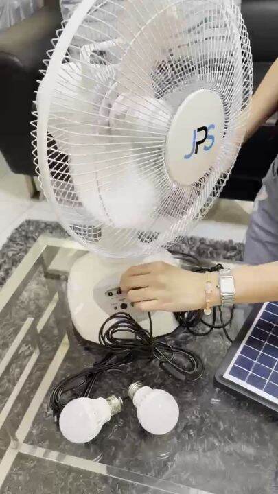 Solar electric fan with charger and 2 bulbs direct 220v and solar panel ...