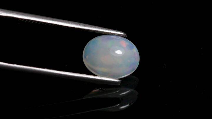1.00 ct พลอยแท้ ไวท์ โอปอล (White opal) เอธิโอเปีย เหลือบรุ้ง ทรงไข่ ...
