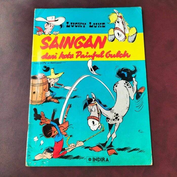 Komik Lucky Luke Saingan dari Kota Painful Gulck (Cet Pertama), Indira ...