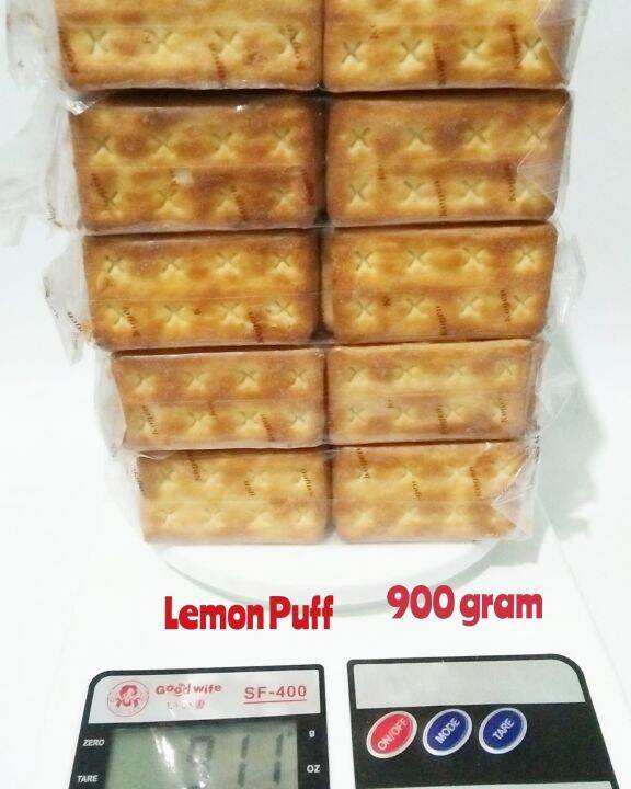 BISCUIT KHONG GUAN LEMON PUFF 900 gram - Biskuit lapis krim rasa lemon ...