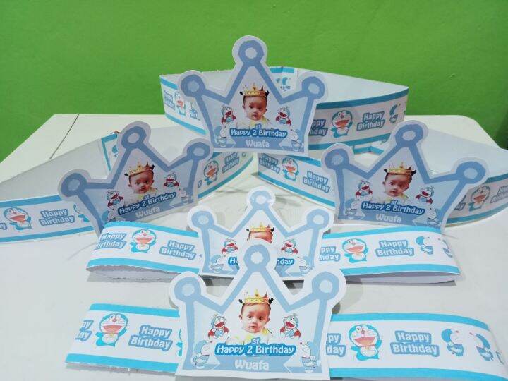 Topi ultah Doraemon desain mahkota isi 50 pcs free design foto bahan ...