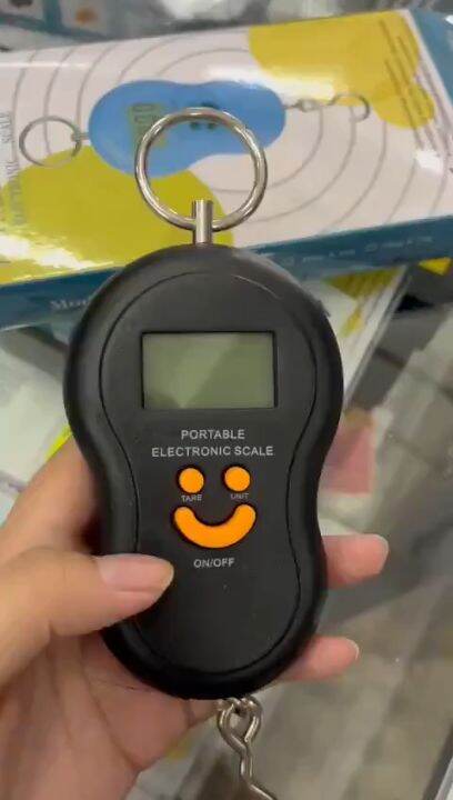 เครื่องชั่งดิจิตอลแบบพกพา เครื่องชั่งกระเป๋าเดินทาง สูงสุด 50kg เครื่อง