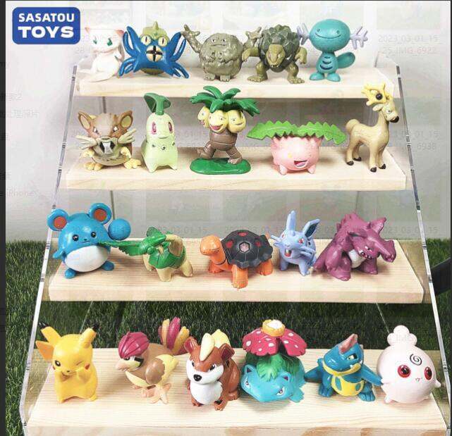 Pokemon figures Pikachu Omastar Torkoal Graveler Golem Hoppip Stantler ...