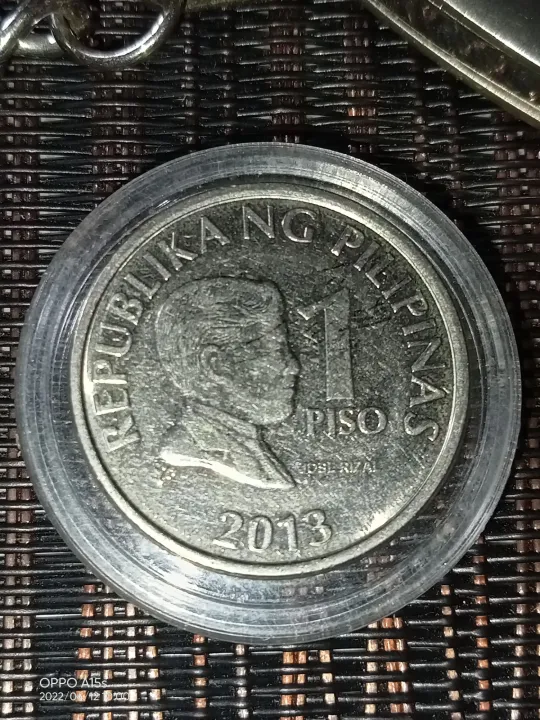 Debris error coin on reverse side 1 Piso hard to find see pictures ...