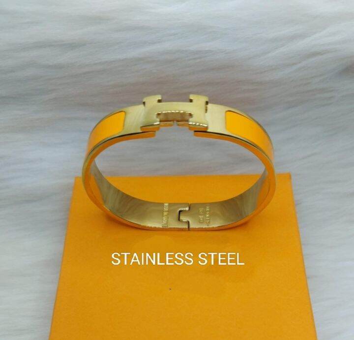 Stainless steel H bangle high quality materials made light orange color ...