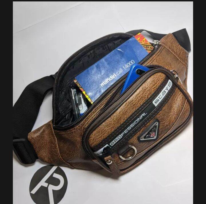 tas model dua multiguna ( pinggang dan dada) terbuat dari bahan semi ...