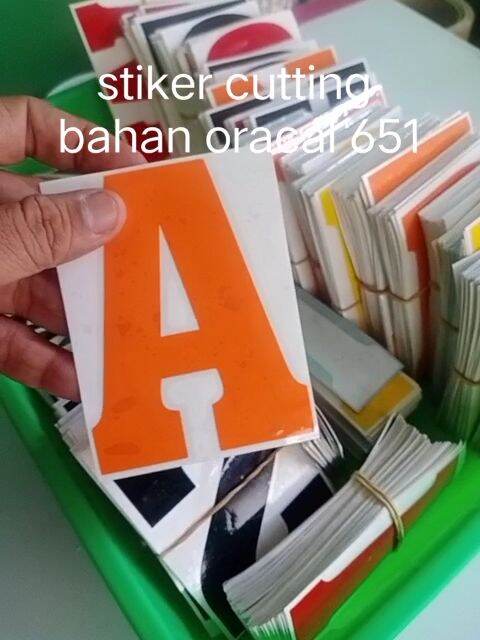 stiker cutting huruf bahan oracal 651-G035 - satu warna - warna oren ...