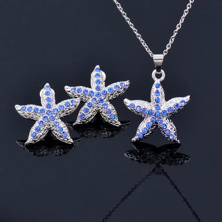 SINLEERY ปลาดาวจี้สร้อยคอต่างหูสำหรับผู้หญิงสีเงินชุดเครื่องประดับสีขาวสีฟ้าสีชมพู Rhinestone ...