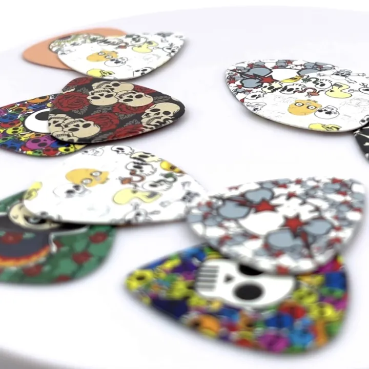 ปิ๊กกีตาร์ 7 ชิ้น ปิ๊กกีต้าร์ Celluloid (เซลลูลอยด์) ปิกกีตาร์ ลายหัว ...