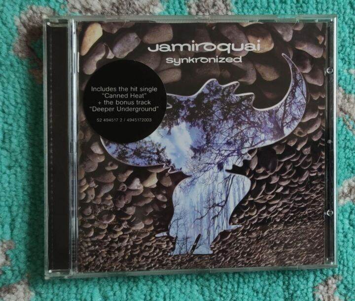 CD เพลง Jamiroquai (จามิโรไคว) อัลบั้ม Synkronized (กลุ่มศิลปินที่ผ่าน ...