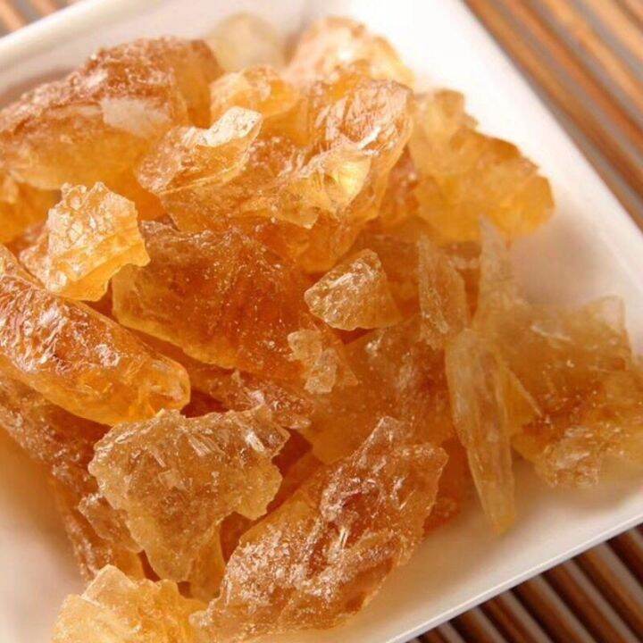 Polycrystalline yellow rock sugar, small pieces of polycrystalline old ...