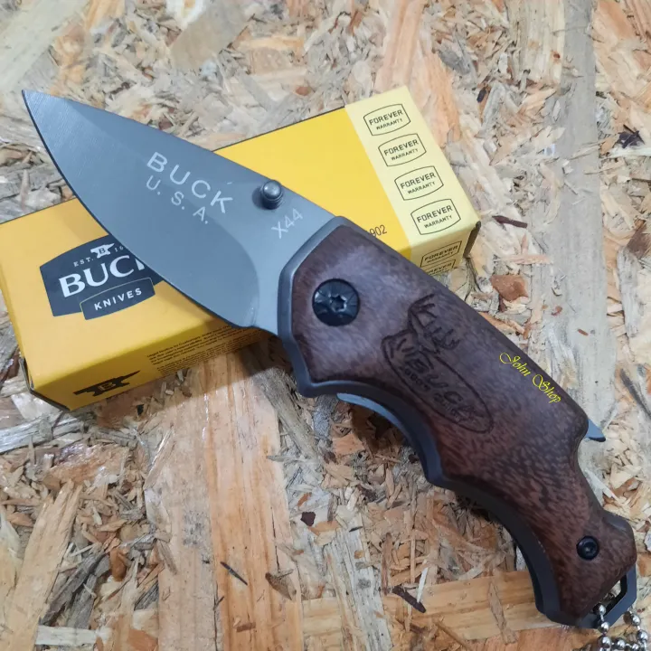 BUCK X44 อุปกรณ์เสริมในการเดินป่า แบบพกพา สีเงินด้ามไม้ ขนาดพกพาน้ำหนัก ...