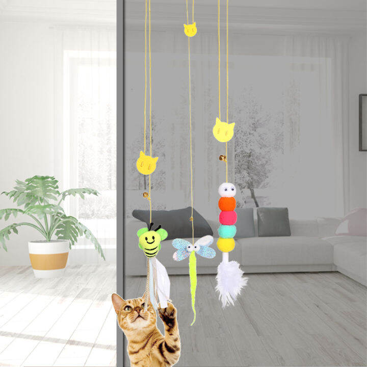 Hanging cat toy with elastic cord, can be hung on glass or door frame ...