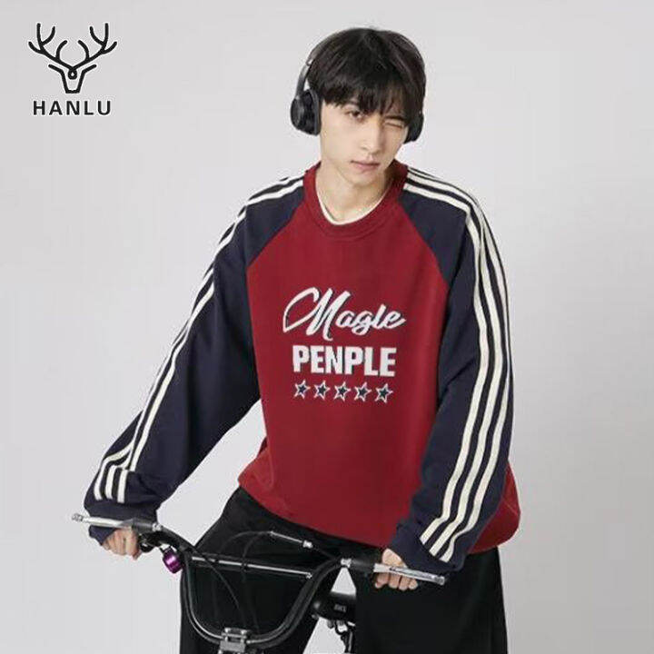 Hanlu สเวตเตอร์ชาย เสื้อคู่รักชายแนววินเทจแบบเสื้อกีฬาคอกลมลายทางแนว ...
