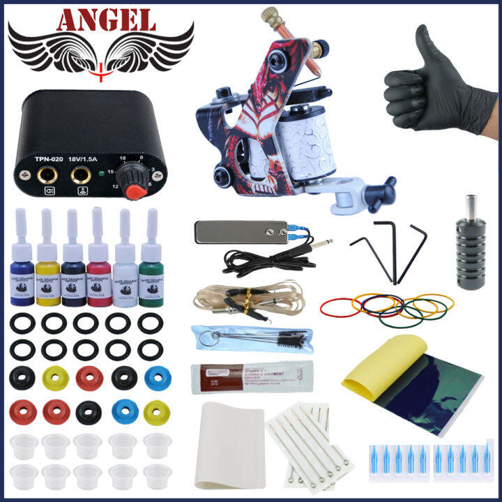 One Tattoo Machine A Complete Set Of Black And Gold Tattoo Machines For ...