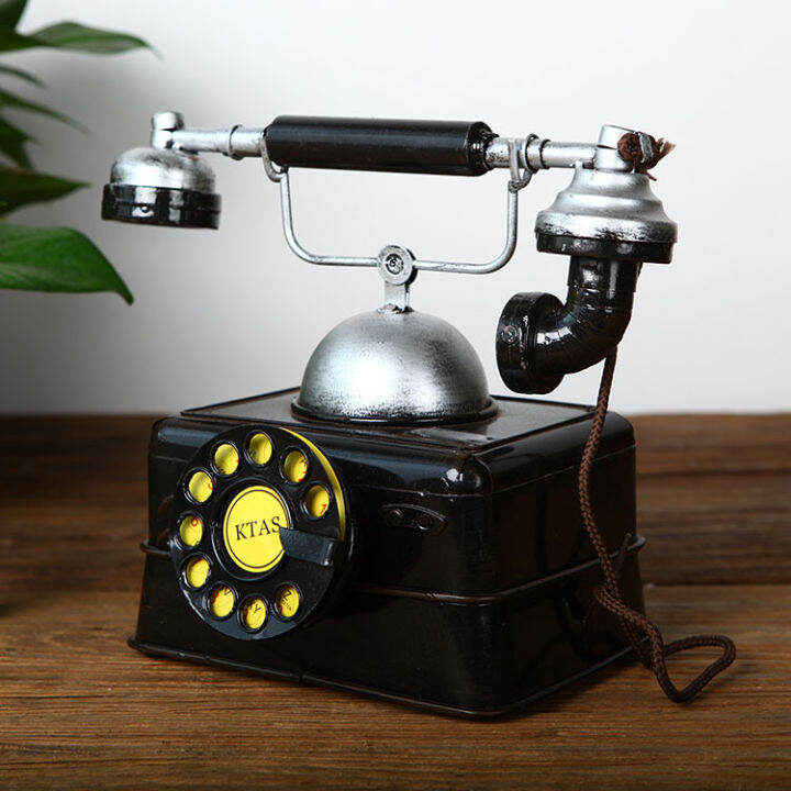 Retro nostalgic wrought iron old telephone landline model storefront ...