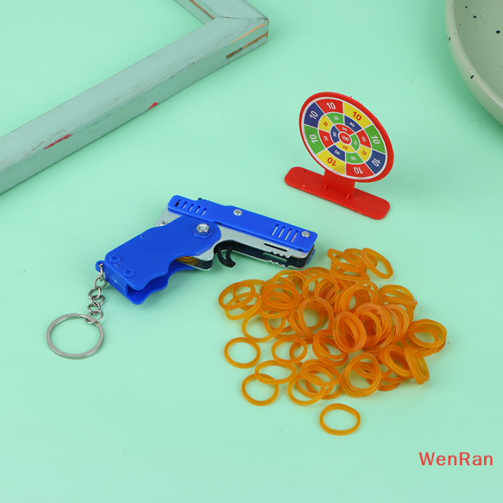 WenRan ปืนโลหะขนาดเล็กพร้อมแถบยางพวงกุญแจปืนพกแบบพับได้สนุกของขวัญวัน ...