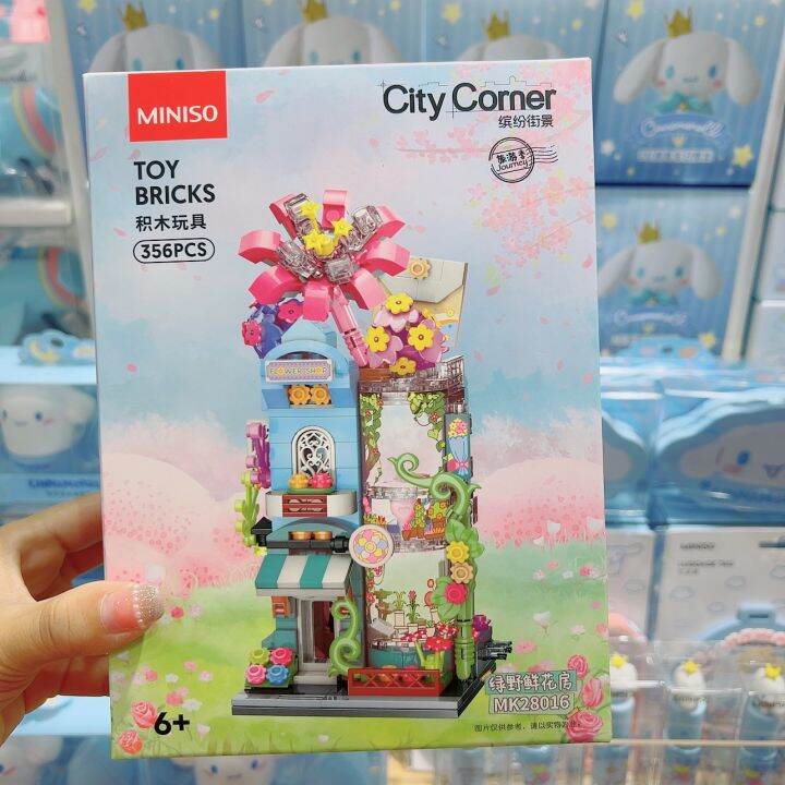 MINISO famous products colorful street view tourist season building ...