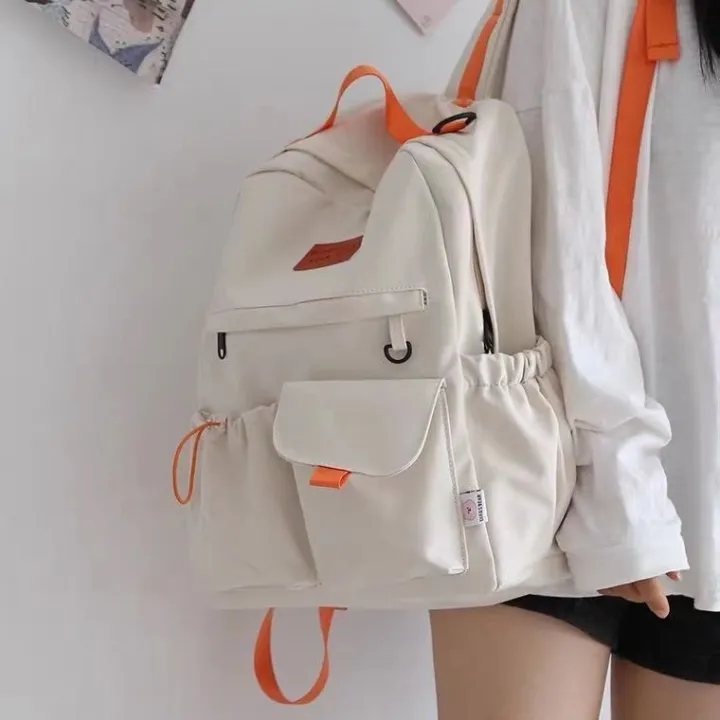 Rice white Japanese bump color backpack female han edition joker bag ...