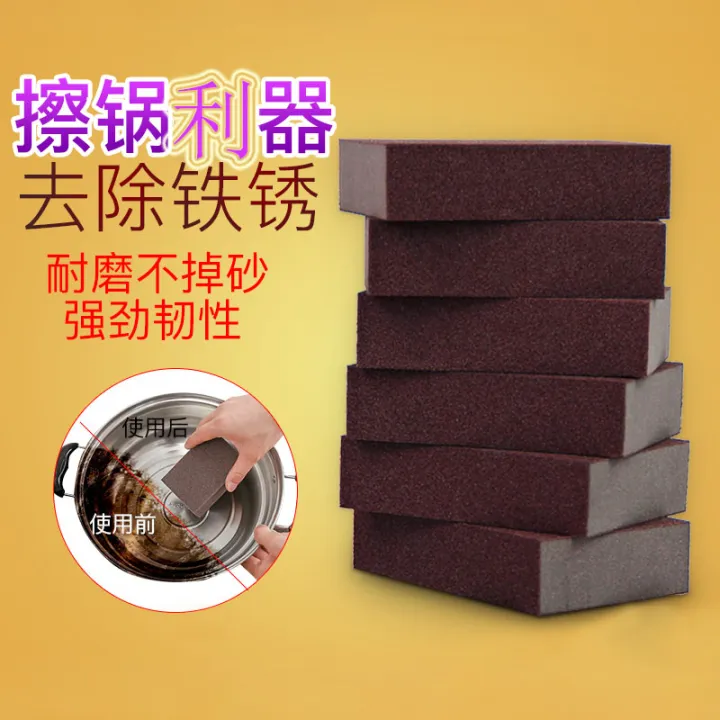 Emery sponge wipes the bottom of the pan to remove dirt and oil stains ...