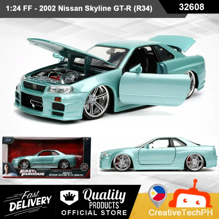 CAR TOY COLLECTION Nissan Skyline GT-R (32608)1:24 FF - 2002 Nissan ...