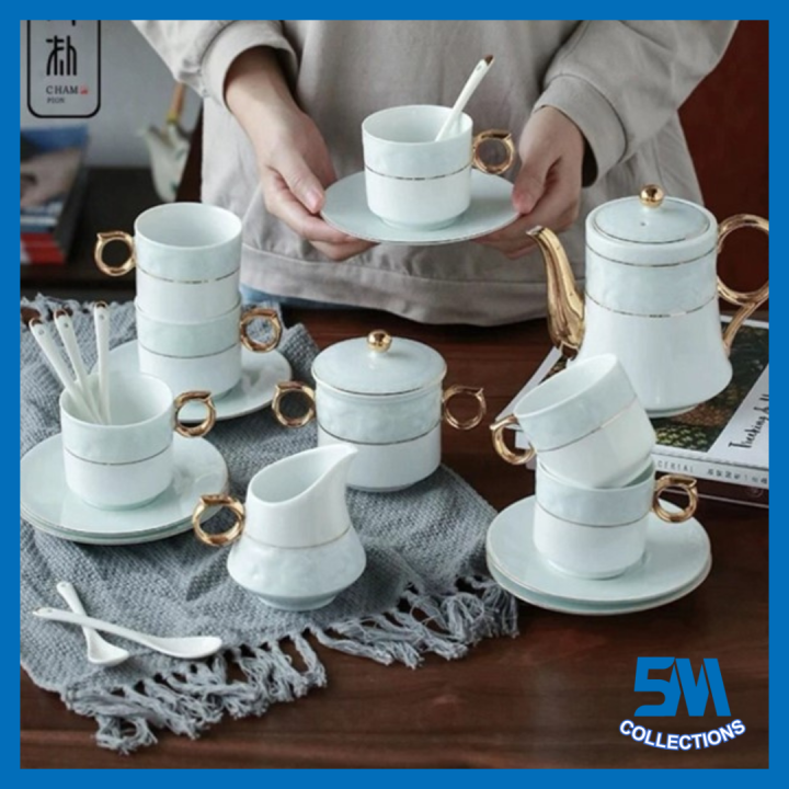 Modern White Coffee/Tea Set with Gold Accent packed in a suitcase ...
