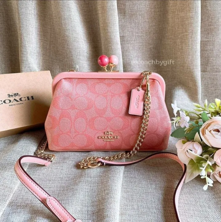 Coach C1452 Nora Kisslock Crossbody In Signature Canvas Women's ...