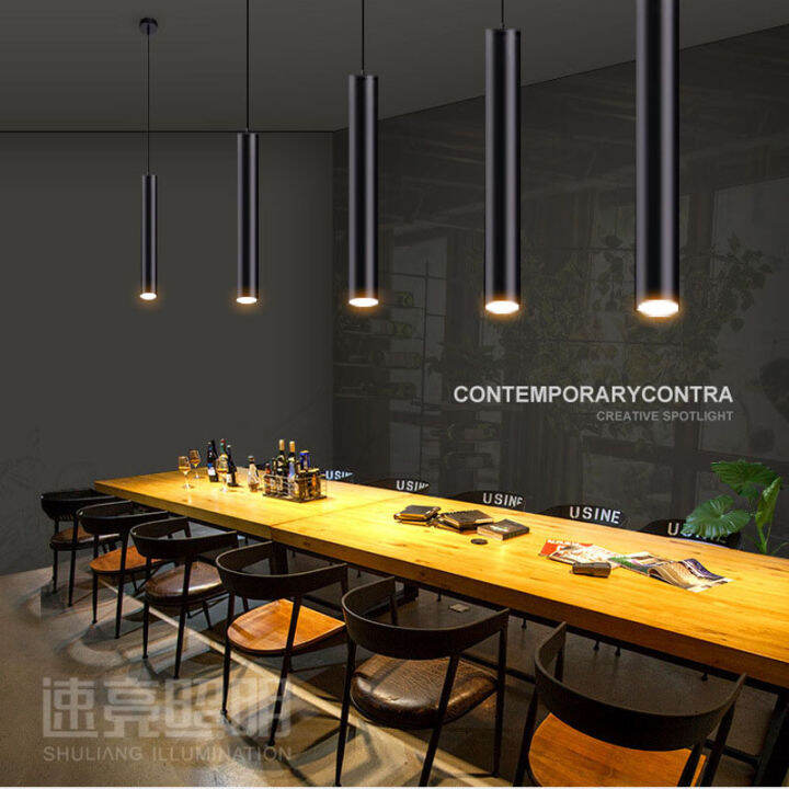 Hanging long tube spotlights cylindrical slender dining room extended ...