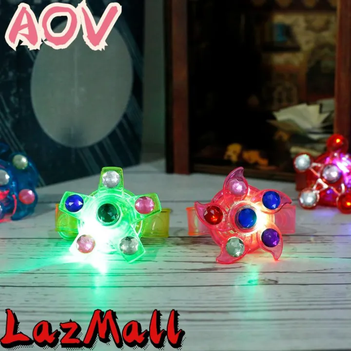 AOV 25ชิ้น LED Light Up อยู่ไม่สุขปินเนอร์สร้อยข้อมือที่มีสีสันเรืองแสงในที่มืด Gyro สายรัด ...