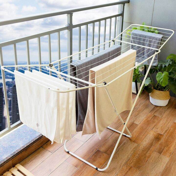 Balcony x-type floor drying rack household folding wing-shaped clothes ...