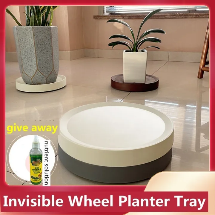 Moved a flower pot tray wheeled chassis with thick circular mute ...
