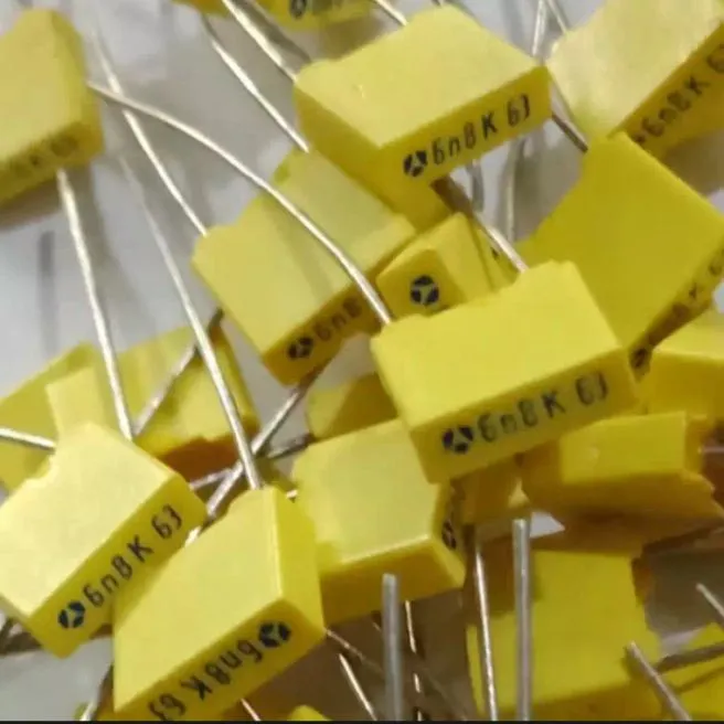 0.0068UF 63V 682PF 6.8NF โพลีเอสเตอร์ คาปาซิเตอร์ ขาห่าง5มิล สีเหลือง ...